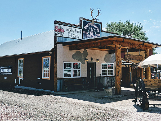 The Emporium's welcoming facade features rustic Wyoming charm with antlers and corrugated metal, capturing the spirit of the West.