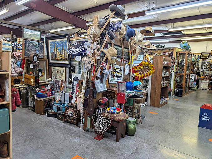 Every corner of Treasures Antique Mall tells a different story. This booth looks like someone's attic, garage, and museum had a beautiful collision.