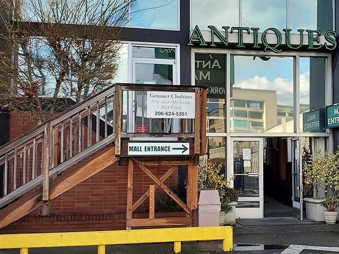 The unassuming entrance to Lander Street Vintage beckons with wooden stairs and that glorious "ANTIQUES" sign&mdash;like a treasure map where X marks the spot.