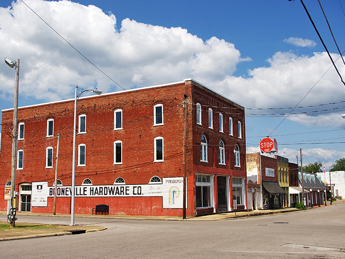 The iconic Booneville Hardware Co. building stands as a testament to small-town resilience, where your dollar stretches further than your weekend plans.