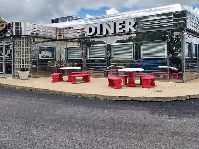 Chrome so bright you might need sunglasses! The Route 66 Diner's gleaming exterior promises a time-traveling feast for both eyes and stomach.