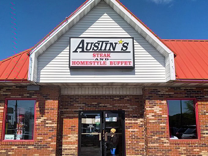 The iconic red-roofed entrance to Austin's stands like a beacon of hope for hungry travelers – promising Southern comfort in buffet form.