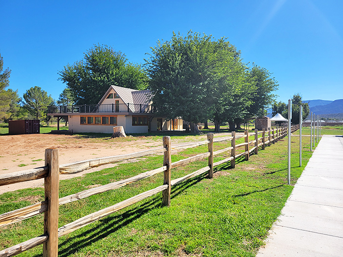 Rustic charm meets natural splendor at the ranch house, where wooden fences guide you into Arizona's newest outdoor playground.