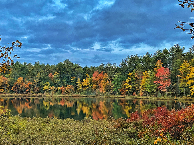 Fall's grand finale at Greenfield State Park creates nature's perfect mirror image. Those colors aren't photoshopped&mdash;they're just New Hampshire showing off.