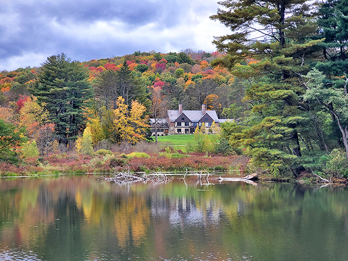 Mother Nature showing off her decorating skills in autumn, with a historic lodge nestled among a tapestry of fall colors that would make any interior designer jealous.