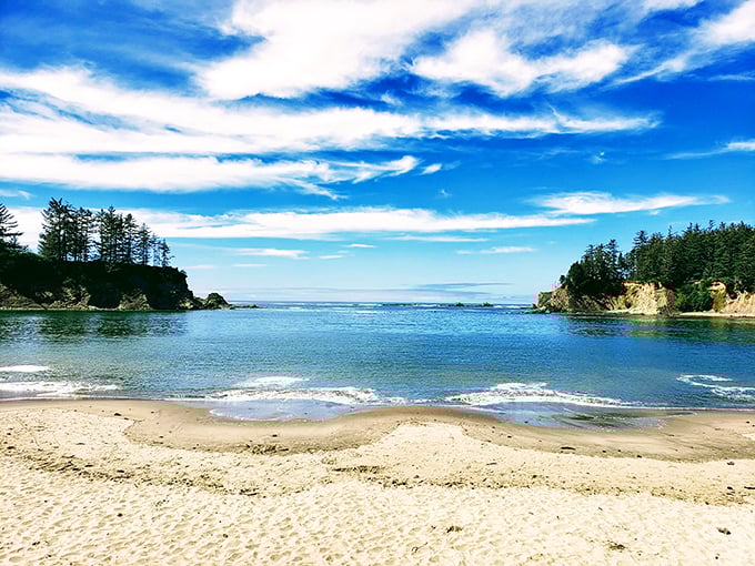 This protected cove proves that sometimes the best beaches come with their own natural security system.