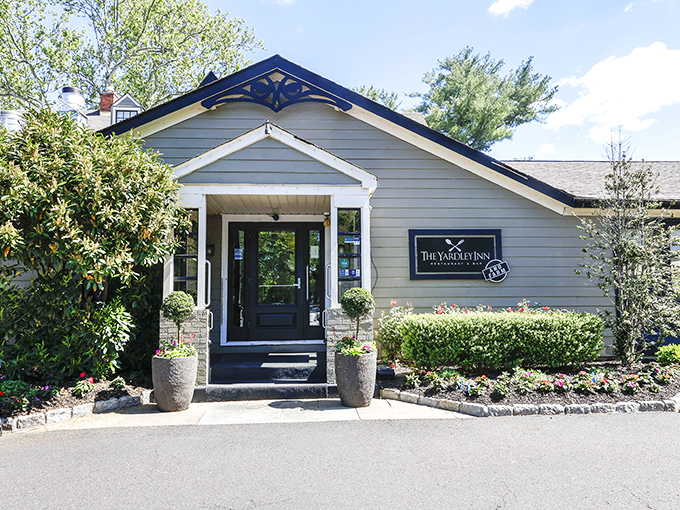 The cream-colored exterior of The Yardley Inn welcomes you like an old friend, with seasonal planters adding just the right touch of charm.