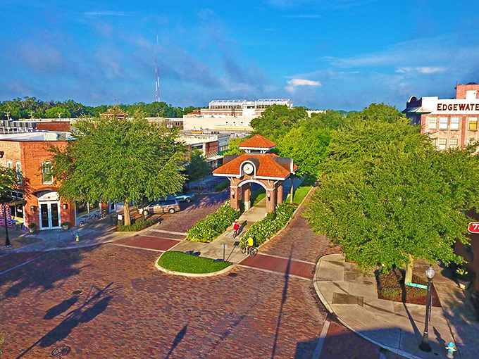 A bird's-eye view of Winter Garden's downtown reveals the perfect blend of preserved history and lush Florida greenery surrounding the signature clock tower.
