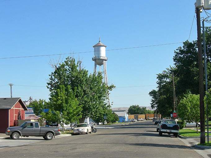 Emmett's iconic water tower stands sentinel over quiet streets, a small-town landmark that says "you've arrived somewhere special" without needing neon.