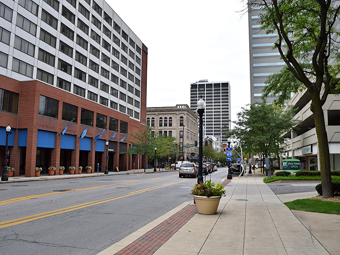 Downtown Fort Wayne's historic buildings stand proudly alongside modern structures, creating a skyline that whispers "affordable big-city vibes" without the big-city price tag.