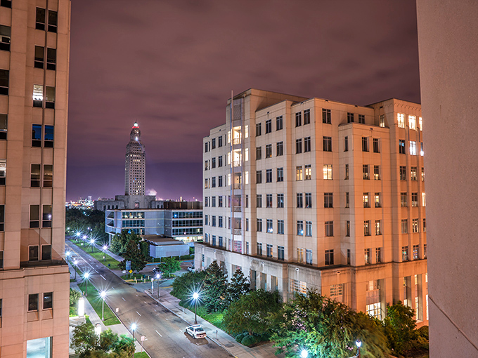 Downtown Baton Rouge glows with possibility at dusk, the Capitol tower standing sentinel like a lighthouse guiding you home to affordable living.