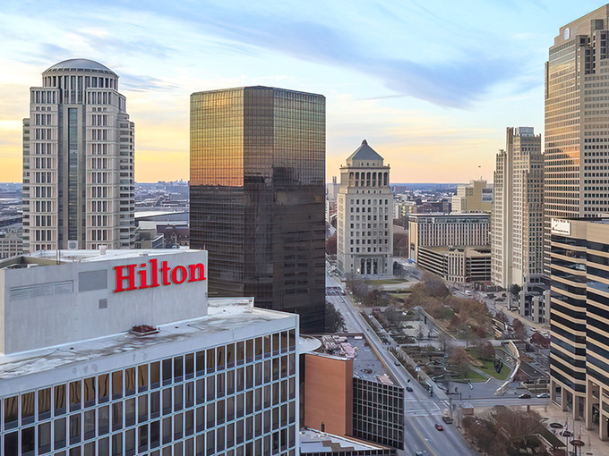 Downtown St. Louis gleams at sunset, where skyscrapers stand tall but housing prices stay refreshingly down-to-earth. The Gateway City's skyline is both impressive and approachable.