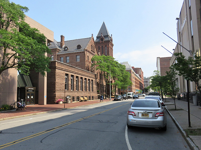 Historic architecture meets modern city life on Rochester's streets, where century-old buildings stand proudly alongside contemporary developments.