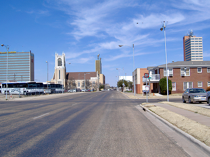 Downtown Lubbock stretches before you like a canvas of urban charm against that impossibly blue West Texas sky. Church steeples and office buildings create a skyline that's modest yet distinctly Texan.