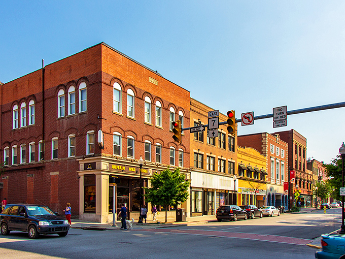 Historic charm meets college-town energy on High Street, where Morgantown's sandstone buildings stand as monuments to both preservation and progress.