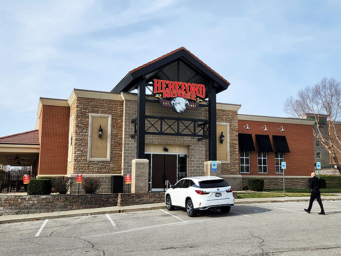 The stone and brick façade of Hereford House stands like a beacon for beef lovers—promising culinary treasures that outshine its humble exterior.