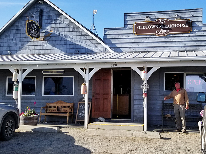 Behind weathered gray shingles and colorful fishing buoys, AJ's rustic exterior hides Homer's premier steakhouse experience, where Alaskan magic awaits.