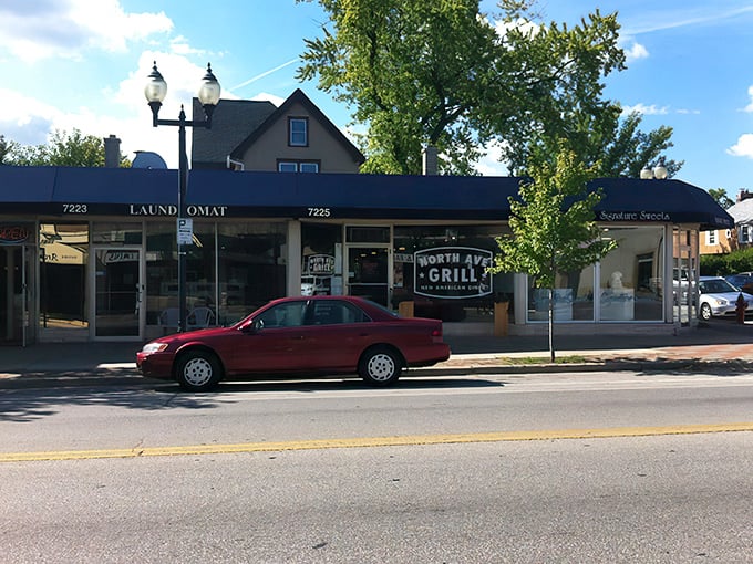 The unassuming exterior of North Avenue Grill sits between a laundromat and other storefronts, proving that culinary treasures often hide in plain sight.