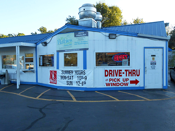 Summer hours posted at Karin's invite locals and travelers alike to experience their legendary kustard during the warmest months.