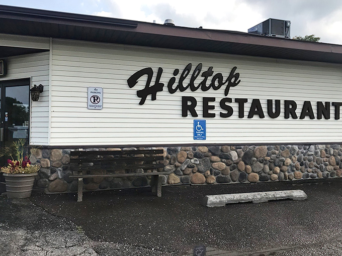 The unassuming exterior of Hilltop Restaurant hides culinary treasures within, like finding a diamond in Michigan's Upper Peninsula rough.
