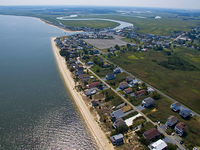 Bowers Beach nestled between marshland and open water. Mother Nature's version of having your cake and eating it too &ndash; wild wetlands on one side, beach on the other.