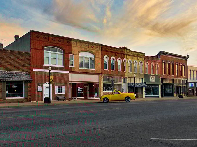 Main Street magic at sunset &ndash; where historic brick facades glow amber and time slows to a pace that makes your smartwatch wonder if it's broken.