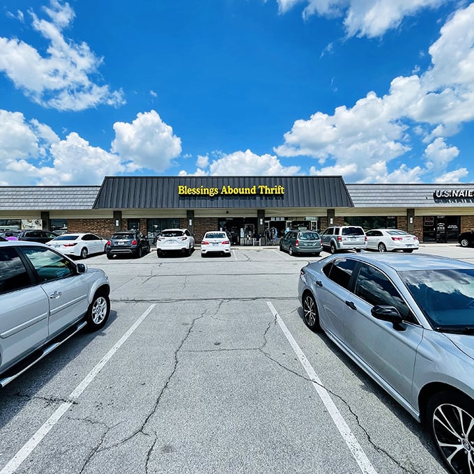 The bright yellow sign against Kansas blue skies promises treasure hunting adventures that won't break the bank.
