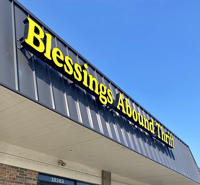 Bold yellow letters beckon bargain hunters like a retail lighthouse guiding ships to safe harbor for their wallets.