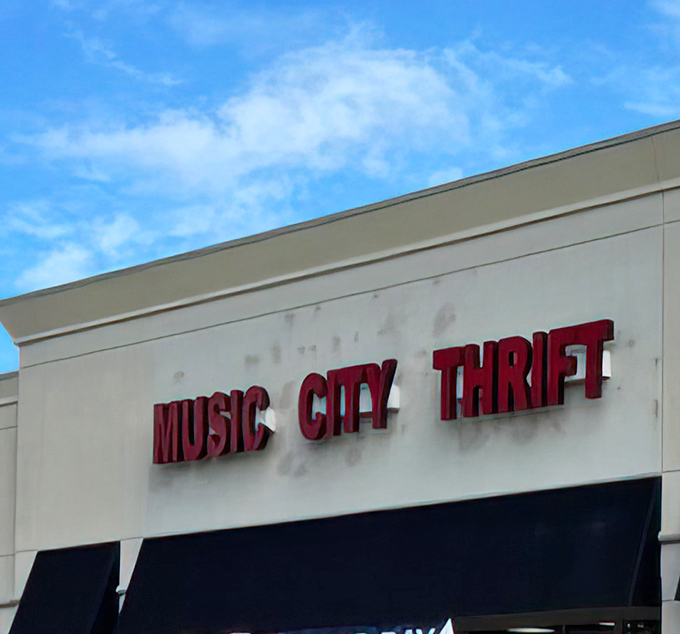 The bold red letters of Music City Thrift stand out against the Nashville sky like a beacon for bargain hunters with designer dreams.