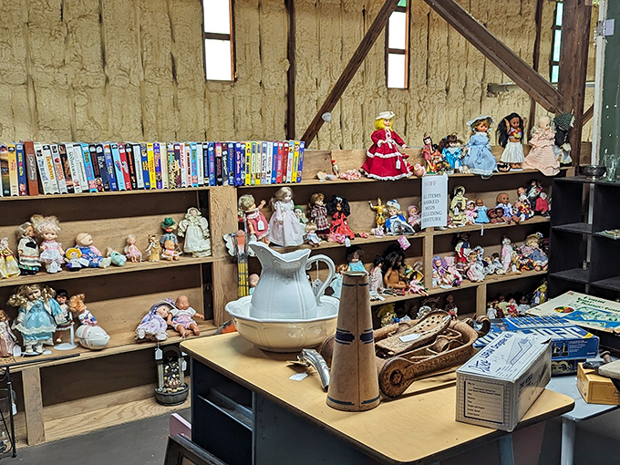 Treasure hunting paradise! Wooden shelves packed with nostalgic collectibles create narrow pathways that feel like stepping into your eccentric aunt's attic&mdash;only better organized.