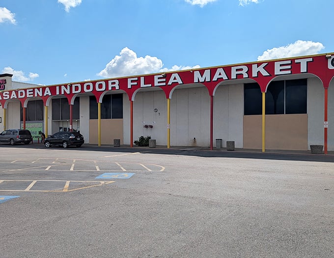 The vibrant red and yellow arches of Pasadena Indoor Flea Market beckon like a carnival of bargains waiting to be discovered.