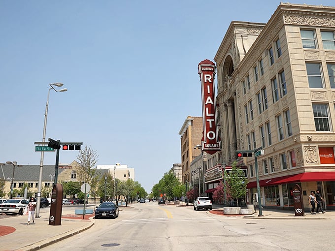 The famous Rialto Square Theatre's vintage marquee stands proudly on Joliet's tree-lined main street, inviting visitors to experience world-class entertainment.