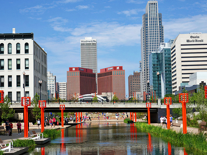 Omaha's revitalized riverfront showcases the perfect marriage of urban architecture and natural beauty. Those vibrant red pillars aren't just decorative&mdash;they're conversation starters.