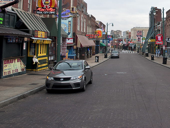 Beale Street in the quiet morning hours, like a blues musician resting between sets, gathering energy before another night of legendary performances.