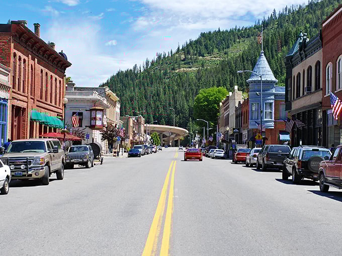 Downtown Wallace stretches before you like a movie set, with historic brick buildings framed by emerald mountains that seem to whisper tales of silver and gold.