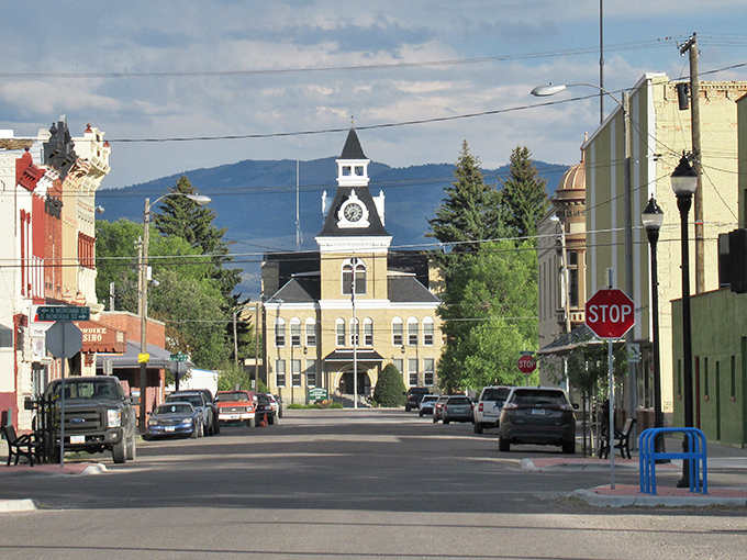 The courthouse stands like a proud timekeeper at the end of Dillon's main street, its clock tower announcing "yes, we're civilized" to the surrounding wilderness.