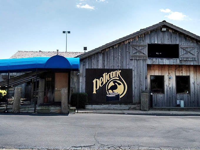 Like a rustic time machine with blue awning, Pelican's weathered wooden exterior promises comfort food that predates food trends and Instagram filters.
