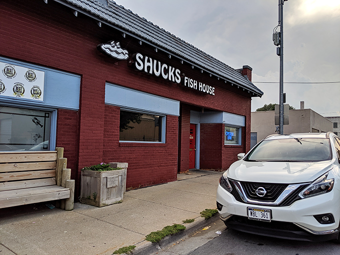 The unassuming red brick exterior of Shucks Fish House hides seafood treasures that would make coastal restaurants blush with envy.