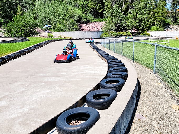 Speed demons take the curves at Amazing Fun Center's go-kart track, where Montana's mountain air adds an extra thrill to every lap.