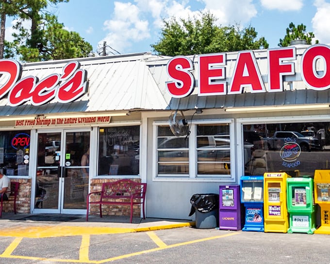 The bold red letters of Doc's SEAFOOD sign don't whisper their promise—they shout it from the rooftop. Best fried shrimp in the entire civilized world? Challenge accepted.