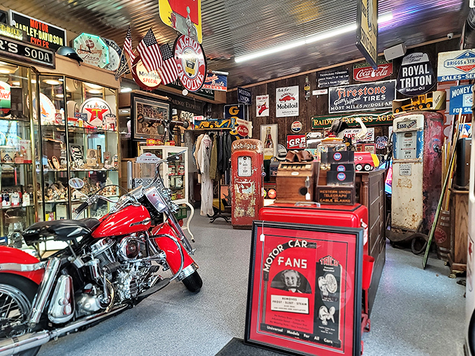 Americana heaven! This vendor's booth is a nostalgic playground where gas station signs and vintage motorcycles transport you to a bygone roadside era.