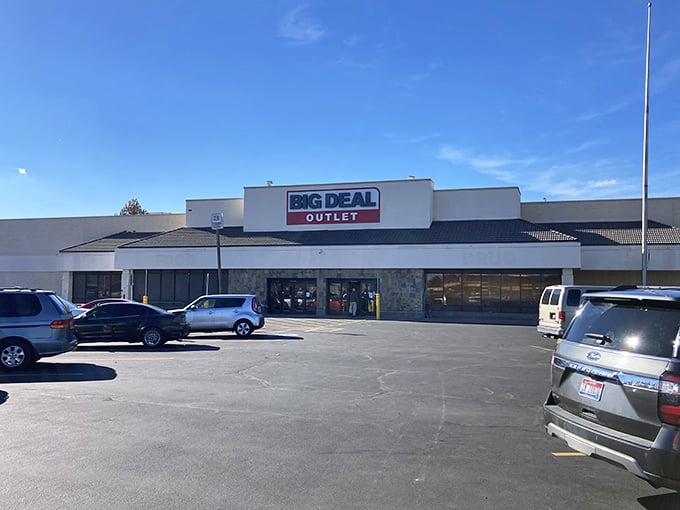 The bold red and black signage of Big Deal Outlet promises exactly what awaits inside&mdash;deals so good they'll make your wallet do a happy dance.