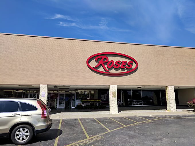 The iconic red Roses sign against a beige facade promises treasure hunting adventures within&mdash;retail therapy that won't require actual therapy for your wallet afterward.