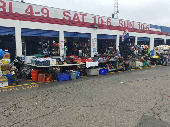 The exterior of Dixieland beckons with its no-nonsense signage and tables spilling into the parking lot—treasure hunting in its purest form.