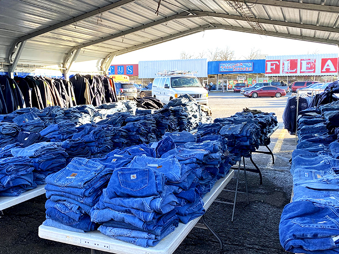 Denim heaven awaits! Tables groan under mountains of blue jeans, proving that in Oklahoma, you're never more than ten feet from a good pair of Levi's.