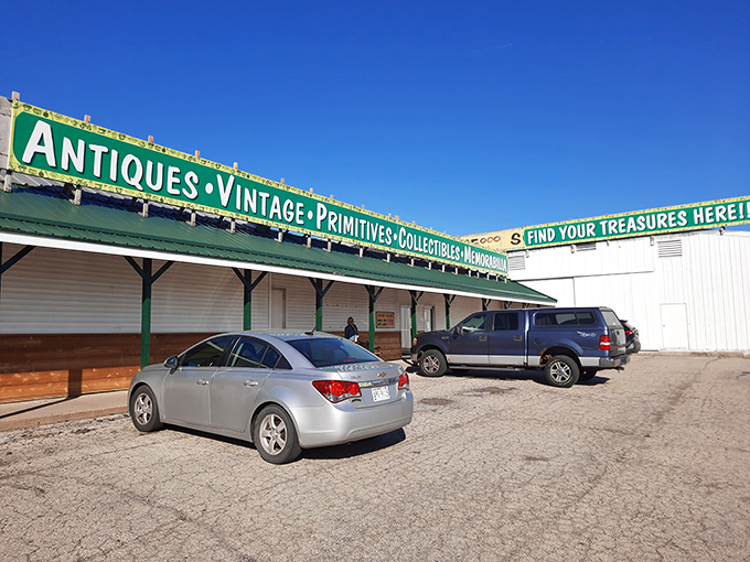 The sign says it all&mdash;Antiques, Vintage, Primitives&mdash;a roadmap to nostalgia waiting just beyond those doors.