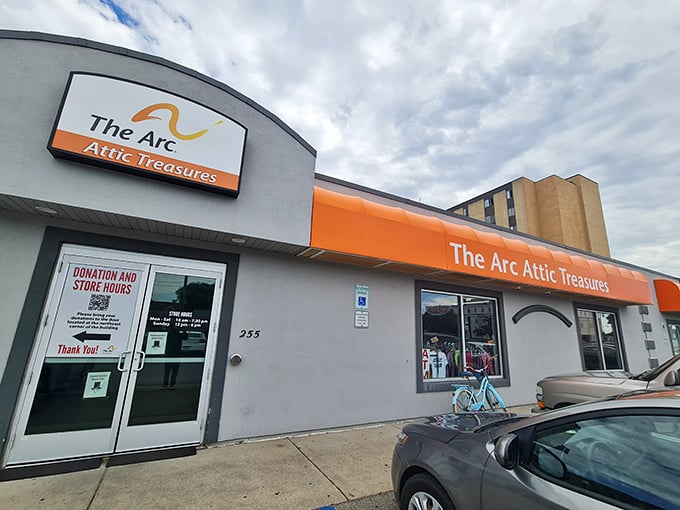 The Arc's distinctive orange signage beckons bargain seekers like a lighthouse for the financially savvy shopper.