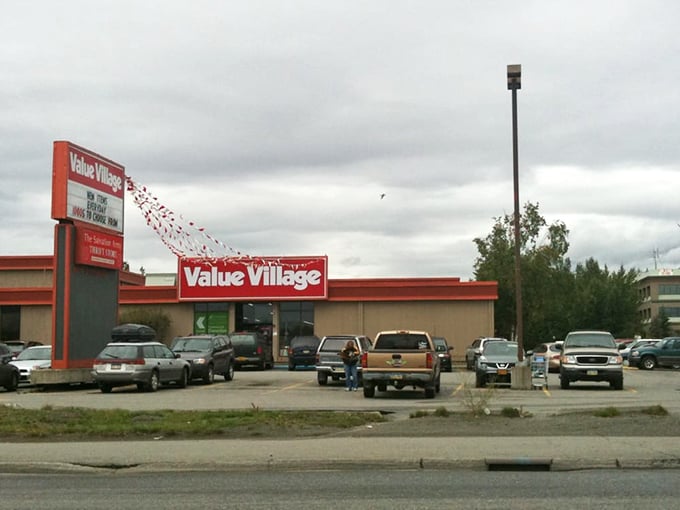 The iconic red and white Value Village sign stands like a beacon of bargain hope against Alaska's often-gray skies. Treasure awaits!