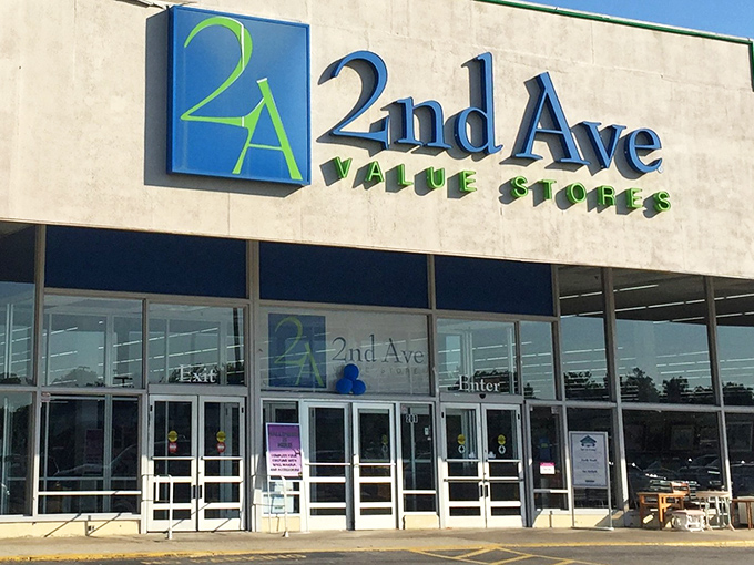 The blue and green signage beckons like a lighthouse for bargain hunters. Welcome to 2nd Ave, where retail prices come to be humbled.