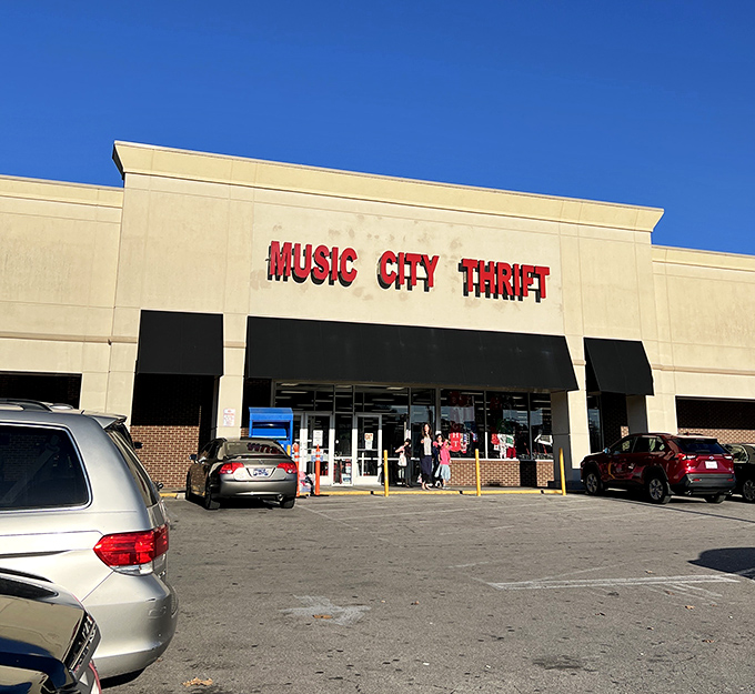 The bold red letters of Music City Thrift stand out against the Nashville sky like a beacon for bargain hunters with designer dreams.